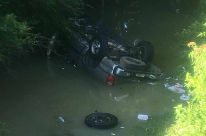 Woman rescued after nine hours in flipped, flooded SUV | wtsp.com